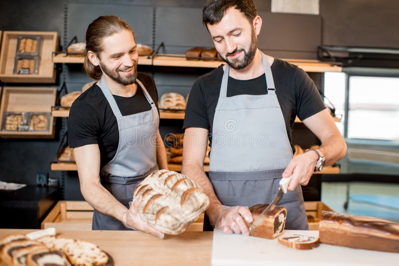 Bread Sellers Working at the Bakery Shop Stock Image - Image of male ...