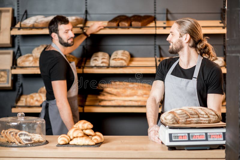 Bread Sellers Working at the Bakery Shop Stock Photo - Image of pastry ...