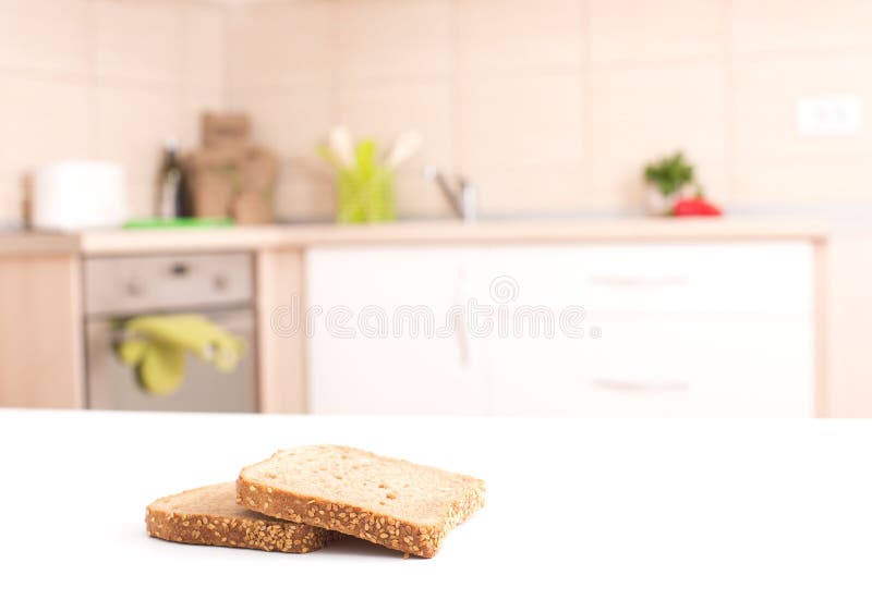 Bread slices on countertop stock image. Image of close - 60706555