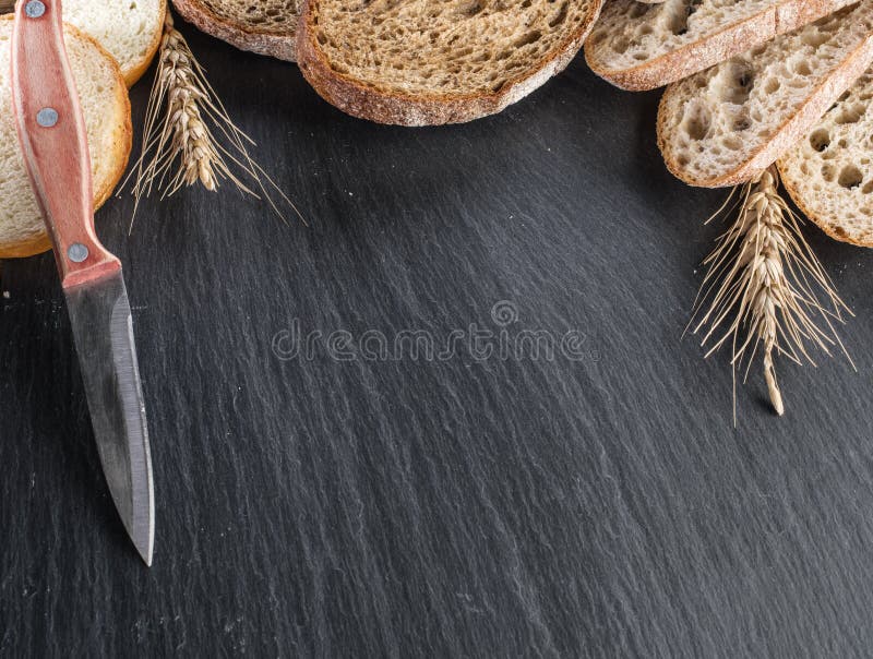 Bread Slices, a Wheat and a Knife. Stock Image - Image of black, bakery ...