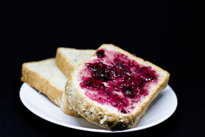 Bread with Spread Jam on the Wooden Dish Stock Photo - Image of dessert ...