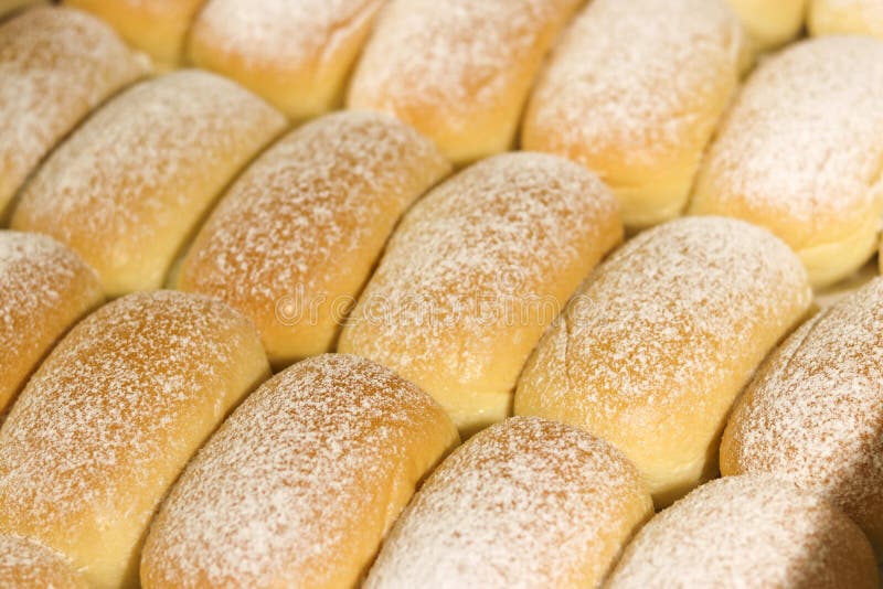 Bread Sprinkled with Icing Sugar, Arranged on Top of the Container ...