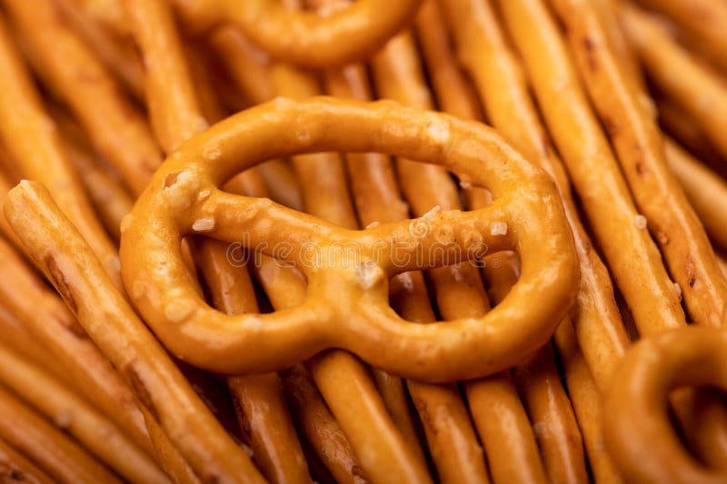 Bread Sticks and Bread Figures with Salt. Close-up Background Image ...