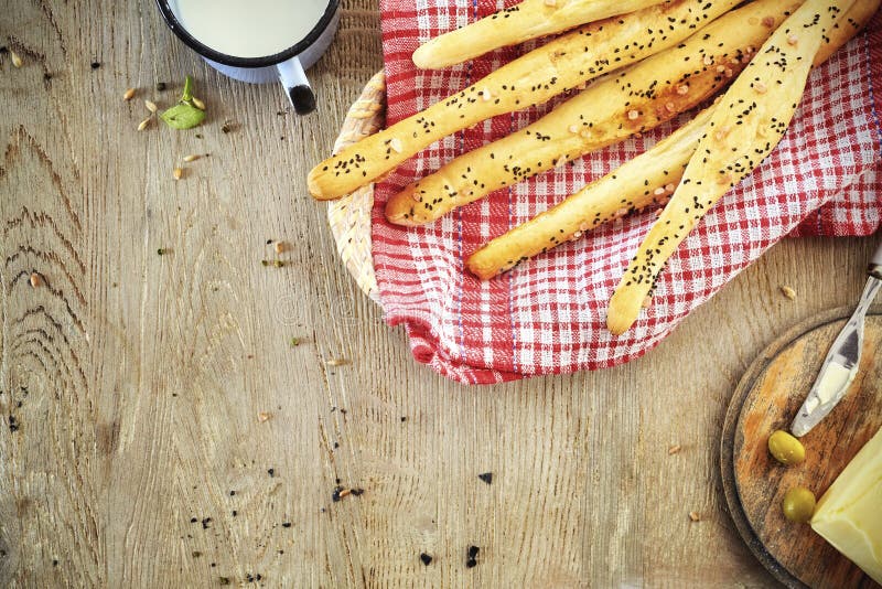 Bread Sticks on a Wooden Table. Stock Photo - Image of butter, fresh ...