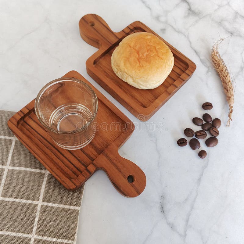 Bread on Teak Wood Stand on White Table Stock Photo - Image of teak ...