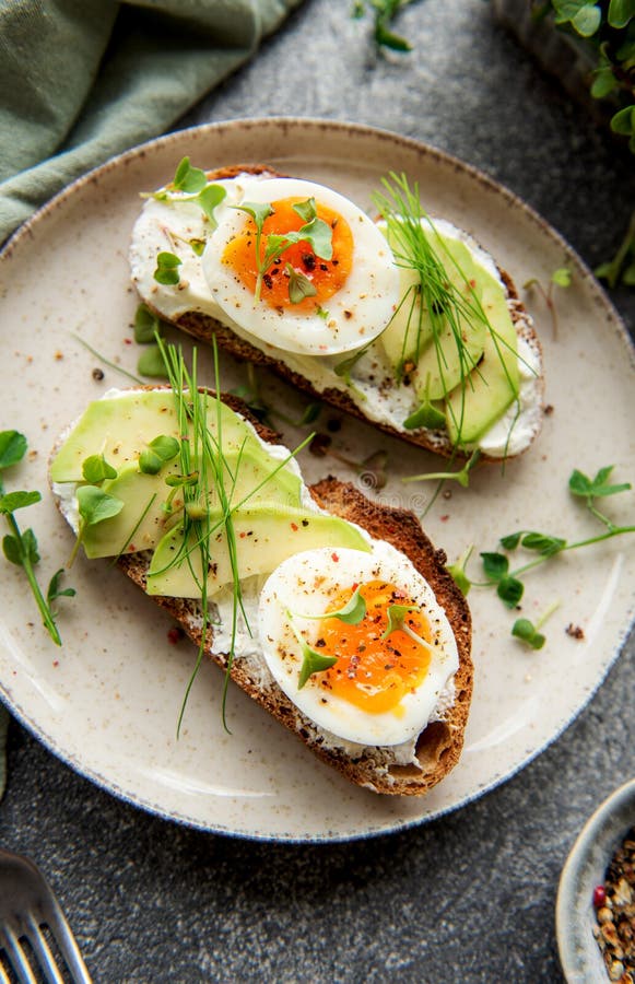 Bread Toast, Boiled Eggs, Avocado Slice, Microgreens on a Plate Stock ...