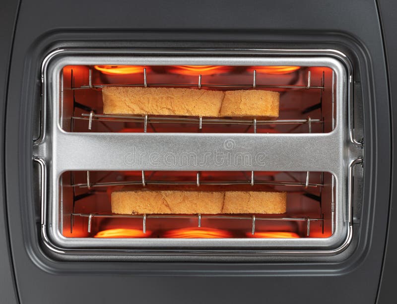 Bread Toasted in Toaster Top View, Close Up. Stock Photo - Image of ...