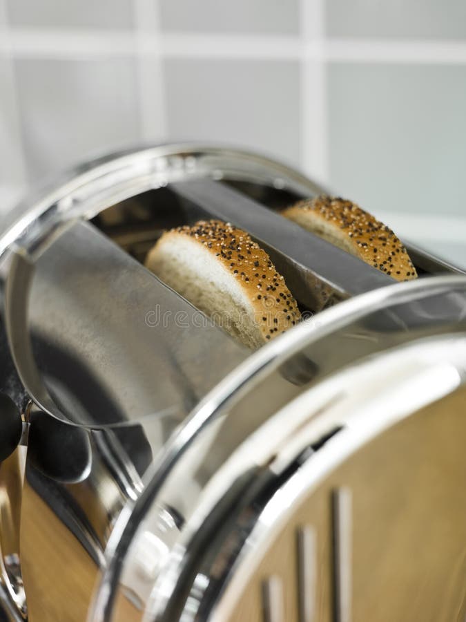 Bread in a Toaster stock photo. Image of present, shiny - 14762622