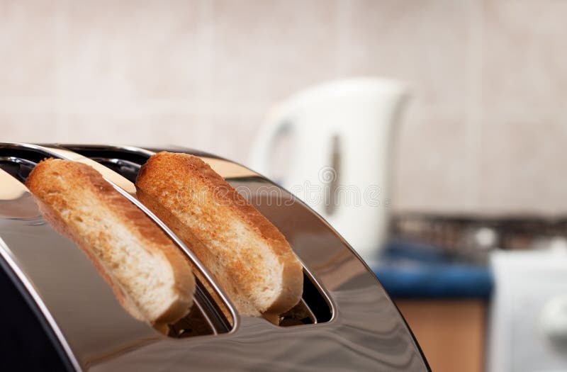 Bread Toaster in the Kitchen Stock Photo - Image of toasted, bread ...