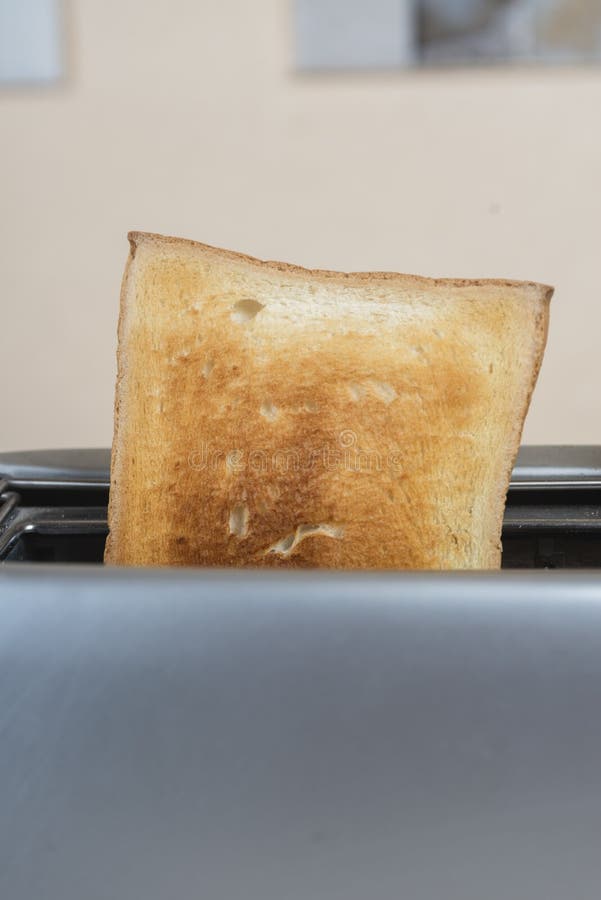 Bread in the Toaster on Wooden Desk. Kitchenware Stock Image - Image of ...