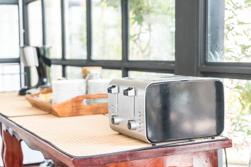 Bread toaster on table stock photo. Image of breakfast - 108770278