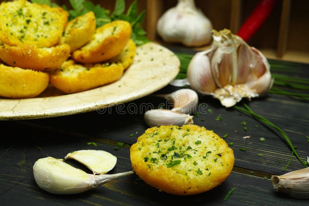 Bread Toasts with Basil, Chives and Garlic Stock Photo - Image of ...