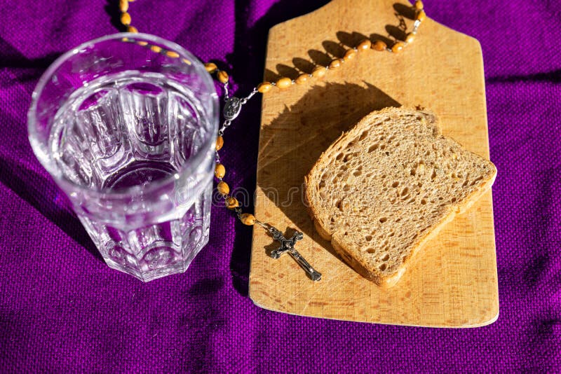 Bread and Water Lent before Easter with Rosary Beads . Stock Photo ...