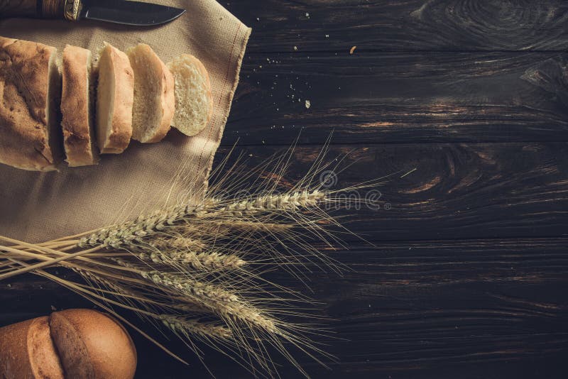 Bread and Wheat on the Table Stock Photo - Image of cereal, homemade ...