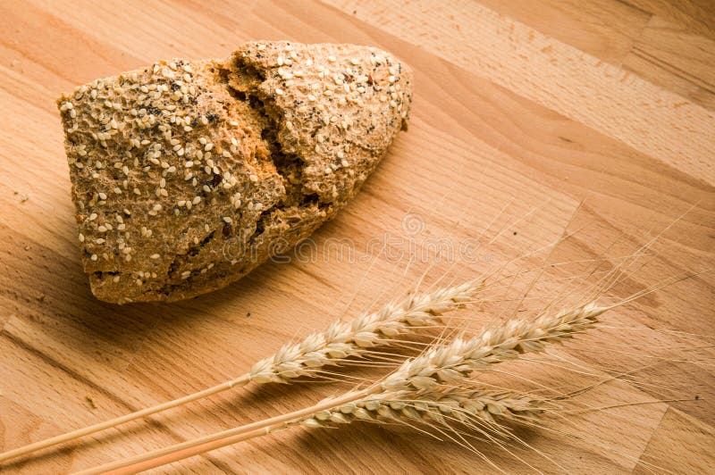 Bread on wooden table stock image. Image of dark, traditional - 63354849
