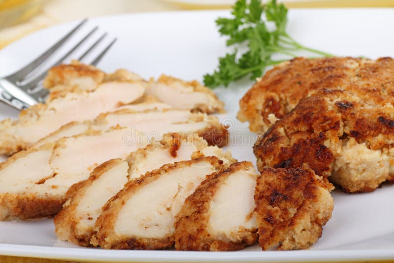 Breaded Chicken Breast stock image. Image of fork, sliced - 20524745