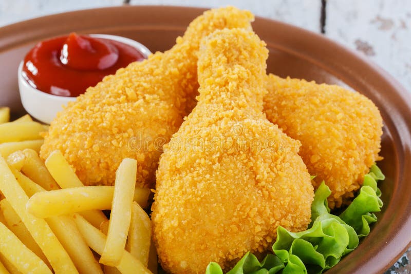 Breaded chicken drumstick stock image. Image of sauce - 40843149