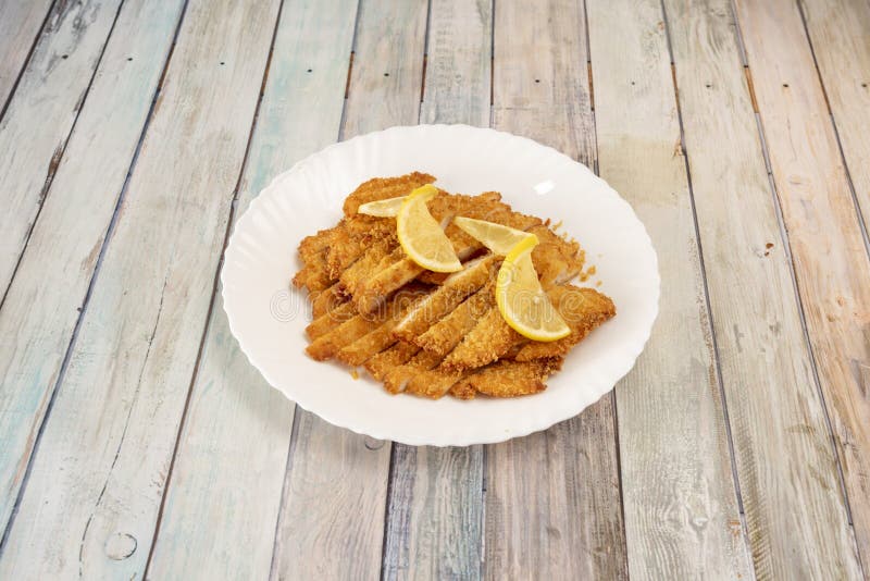 Breaded Chicken Fillet with Sauces, Cooked Basmati Rice and Salad Stock ...