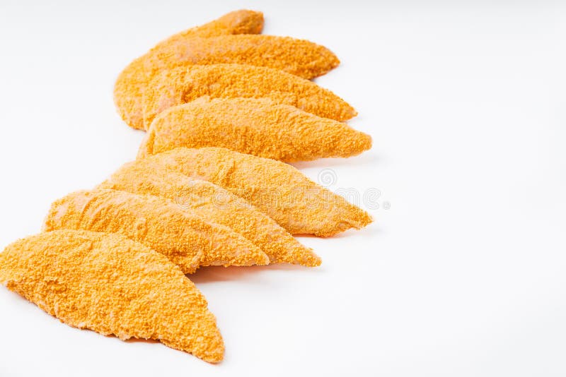 Breaded Chicken Inner Fillet on a White Background, Chicken Breaded Raw ...