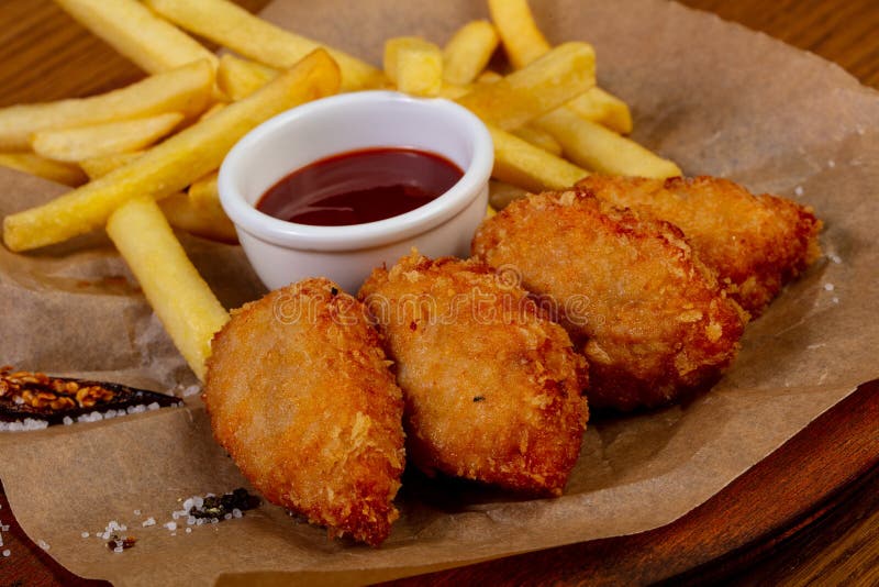 Breaded chicken nuggets stock image. Image of group - 129721997