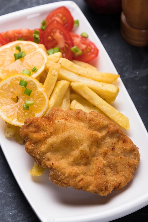 Breaded Cutlet with French Fries Stock Photo - Image of vienna, steak ...