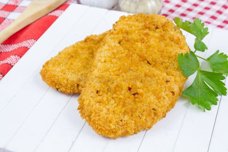Breaded escalope stock image. Image of wooden, lunch - 162063133