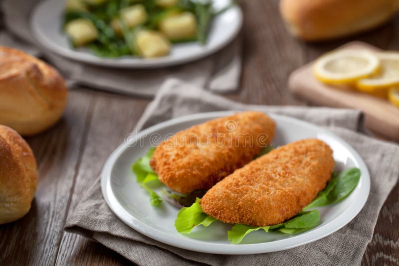 Breaded Fish Fillet with Salad. High Quality Photo. Stock Photo - Image ...