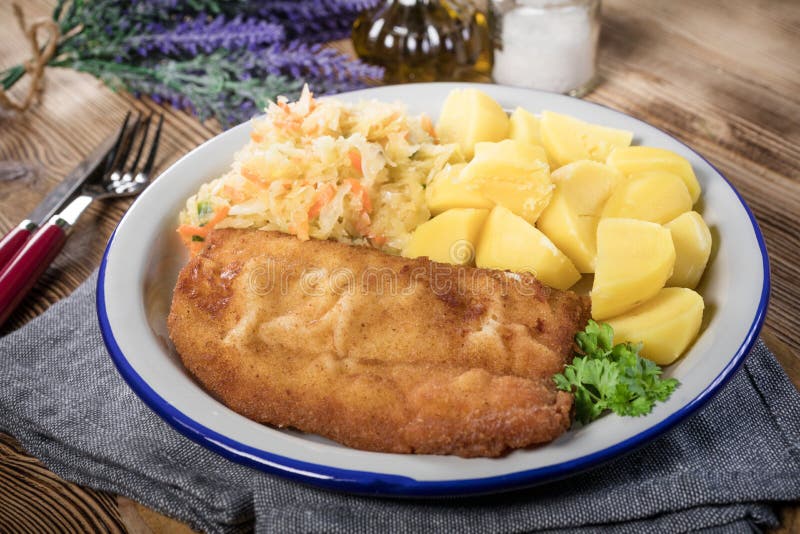 Breaded cod fillet stock image. Image of prepared, sauerkraut - 191720071