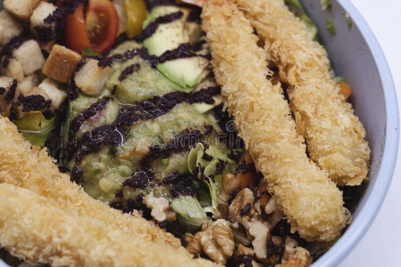 Breaded Food with Many Nuts and Vegetables with Sauce Stock Photo ...