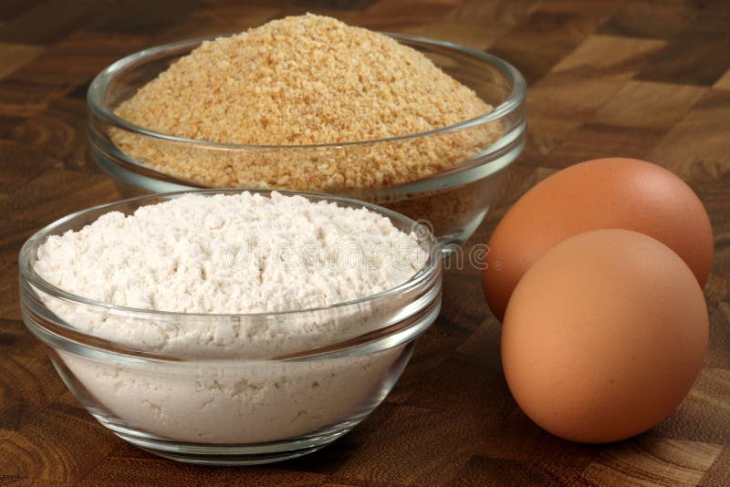 Breaded ingredients stock image. Image of whipped, bowl - 15120223