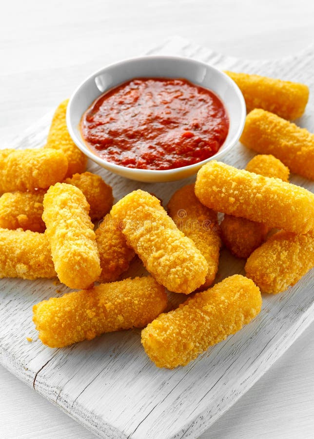 Breaded Mozzarella Cheese Sticks with Tomato Basil Sauce Stock Photo ...