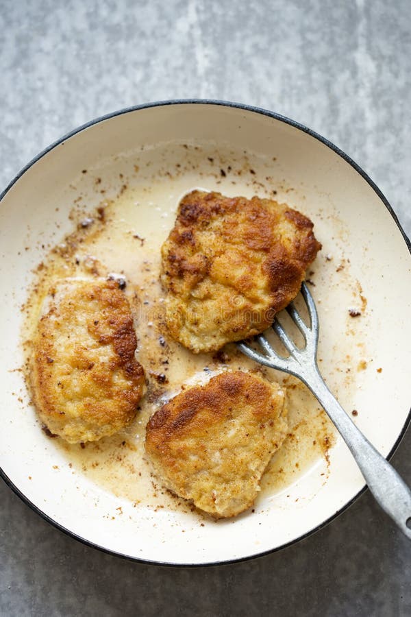 Breaded Pork Chops Fried on the Pan Stock Photo - Image of grilled ...