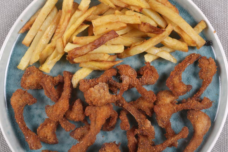 Breaded Rabbit Ribs with Fried Potatoes Stock Image - Image of breaded ...