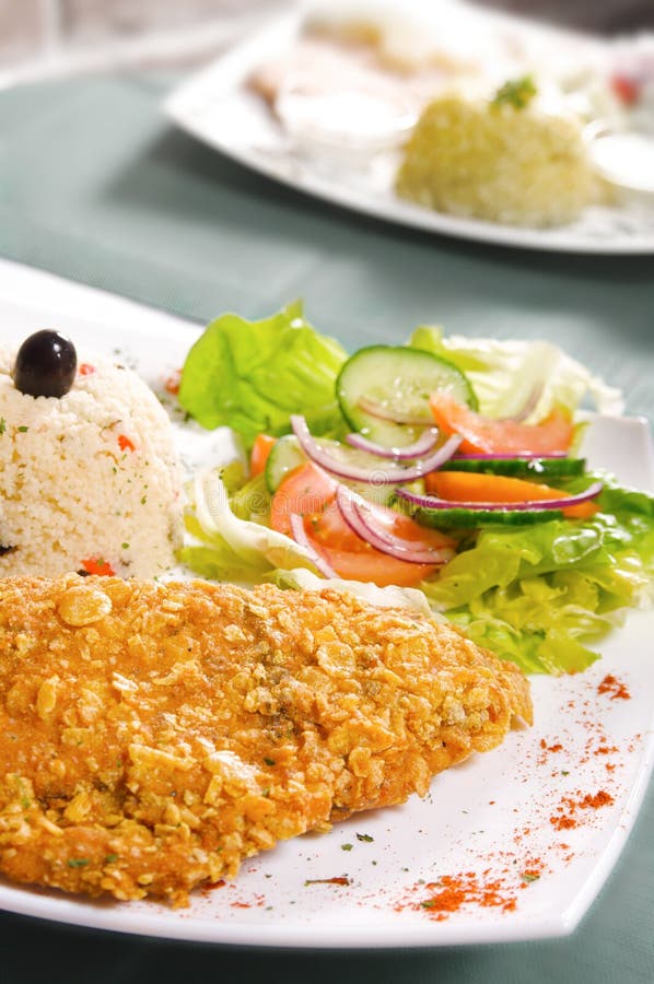 Schnitzel with rice stock photo. Image of food, rice - 30176464