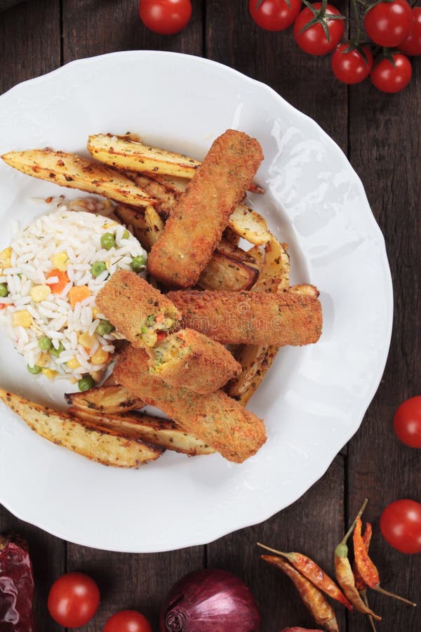 Breaded Veggie Sticks with Cooked Rice Stock Image - Image of cooked ...