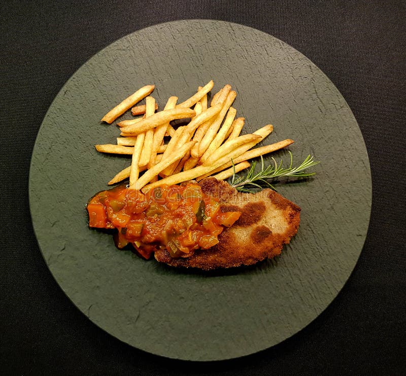 Breaded wiener schnitzel stock image. Image of grilled - 278175371