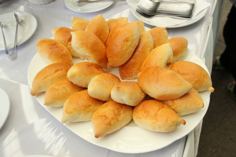 Breads on banquet table stock image. Image of gourmet - 65509753