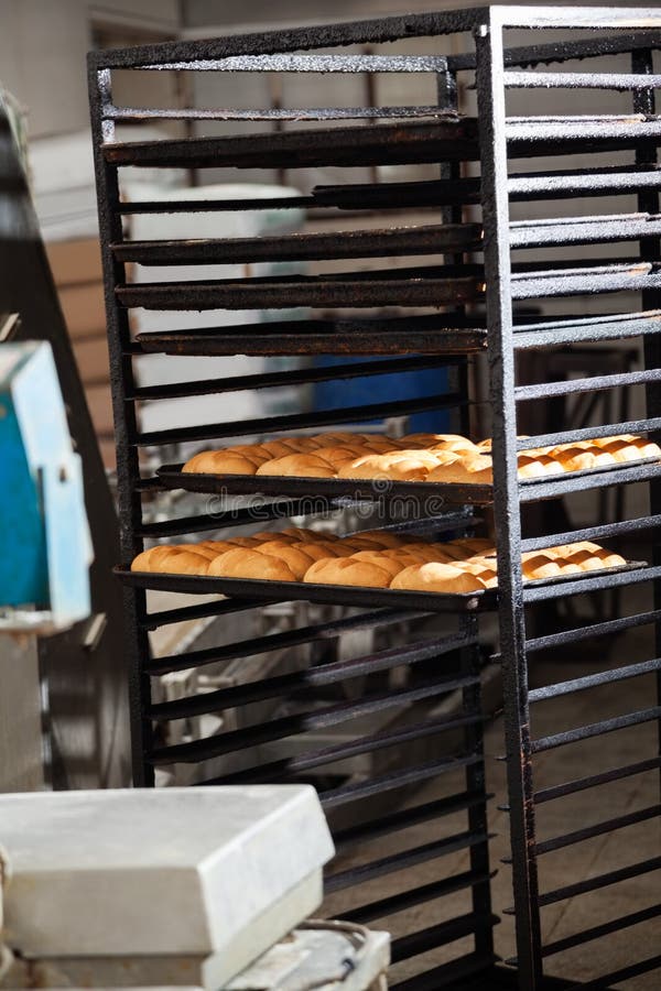Breads in Metal Rack at Bakery Stock Photo - Image of commercial ...