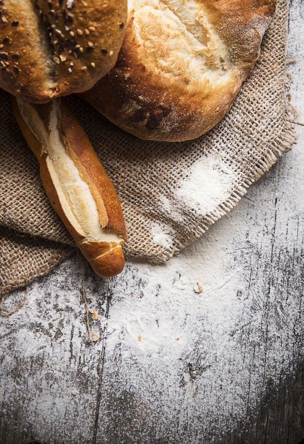 Breads on wooden table stock image. Image of rural, diet - 108028653