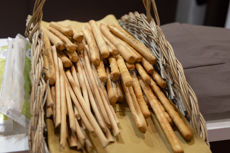 Breadsticks of Different Shapes and Sizes in a Woven Wicker Basket ...