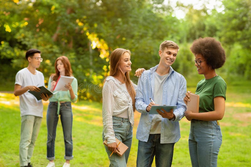 Break between Classes. Group of Multicultural College Students Resting ...