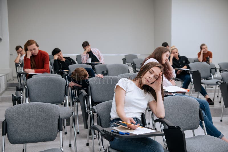 A Break between Classes in High School. Students Rest and Sleep in the ...