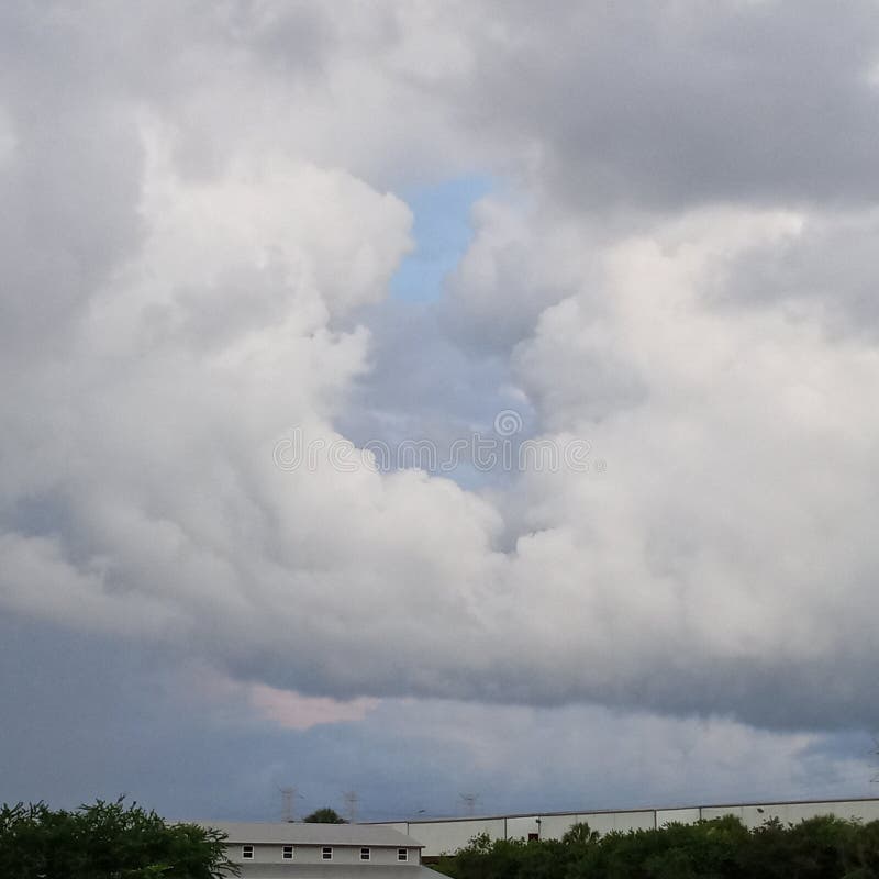 Break in the clouds stock photo. Image of lightning - 219923150