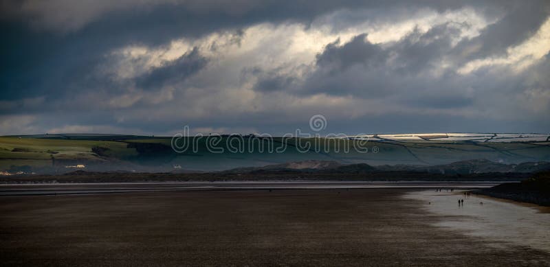 A Break in the Clouds, Westward Ho in Winter. Devon, UK. Stock Image ...