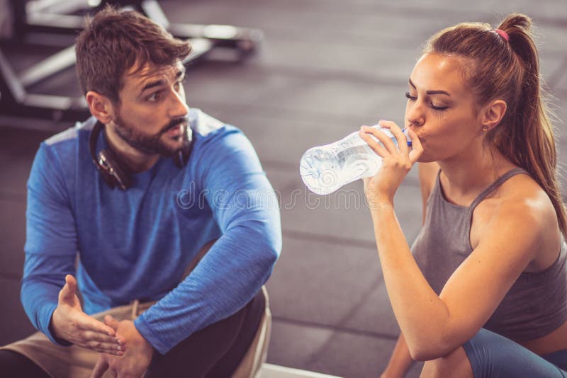 Break after exercise. stock photo. Image of smiling - 120293844
