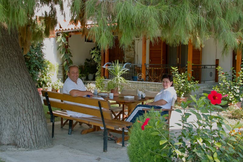 Break in the garden stock photo. Image of people, bench - 66434432