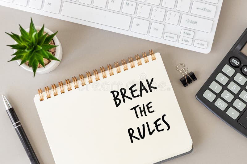 Break the Rules, Conceptual Words Written in a Notebook on a Desk in the Office, Unconventional ...