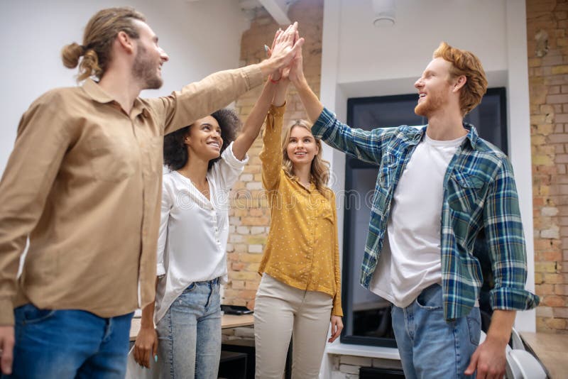 Team of Young People Working Together and Having a Break Stock Photo ...