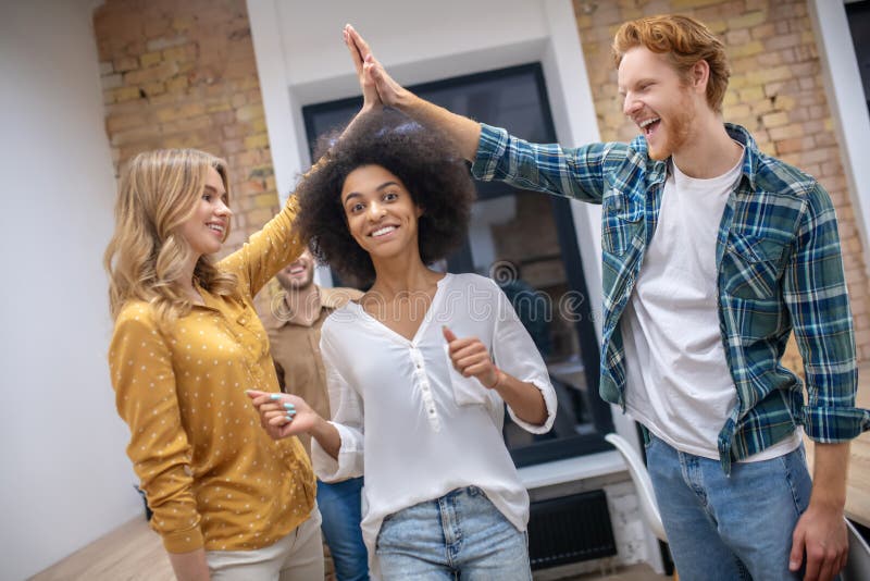 Team of Young People Working Together and Having a Break Stock Photo ...