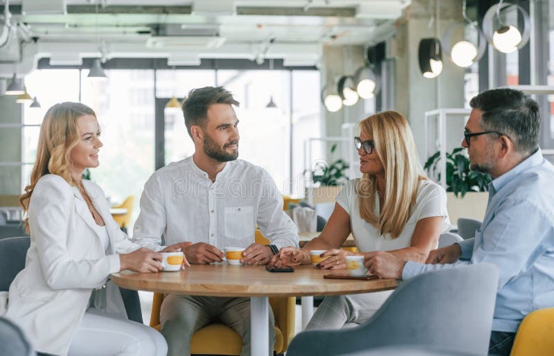 Break Time with Drinks. Group of Professional Business People is in the ...